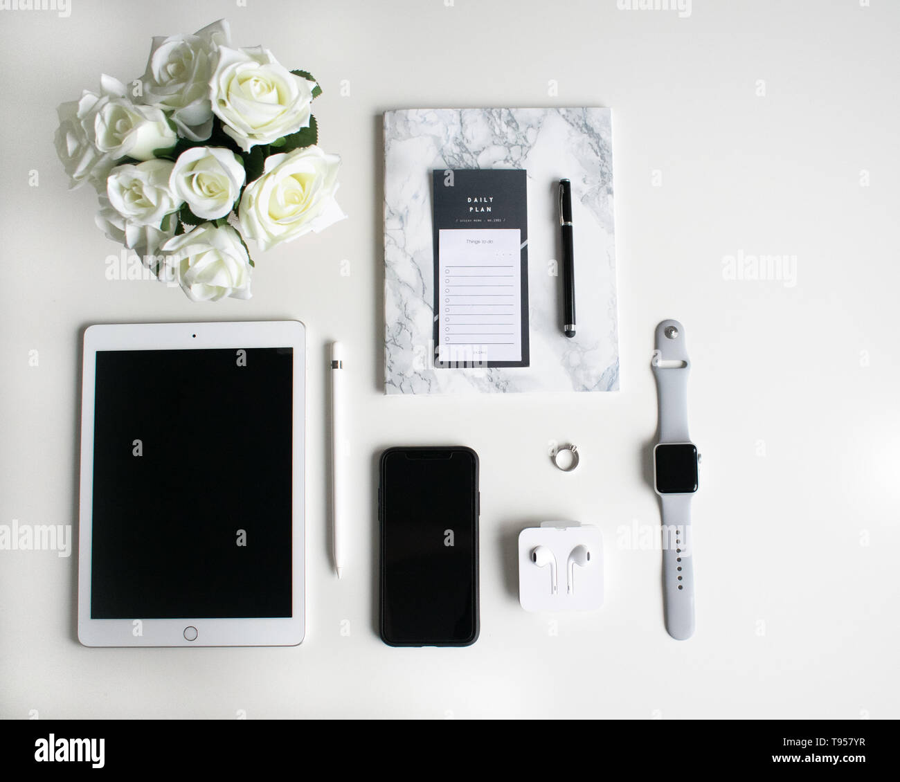 flat lay: Apple products on black and white background Stock Photo - Alamy