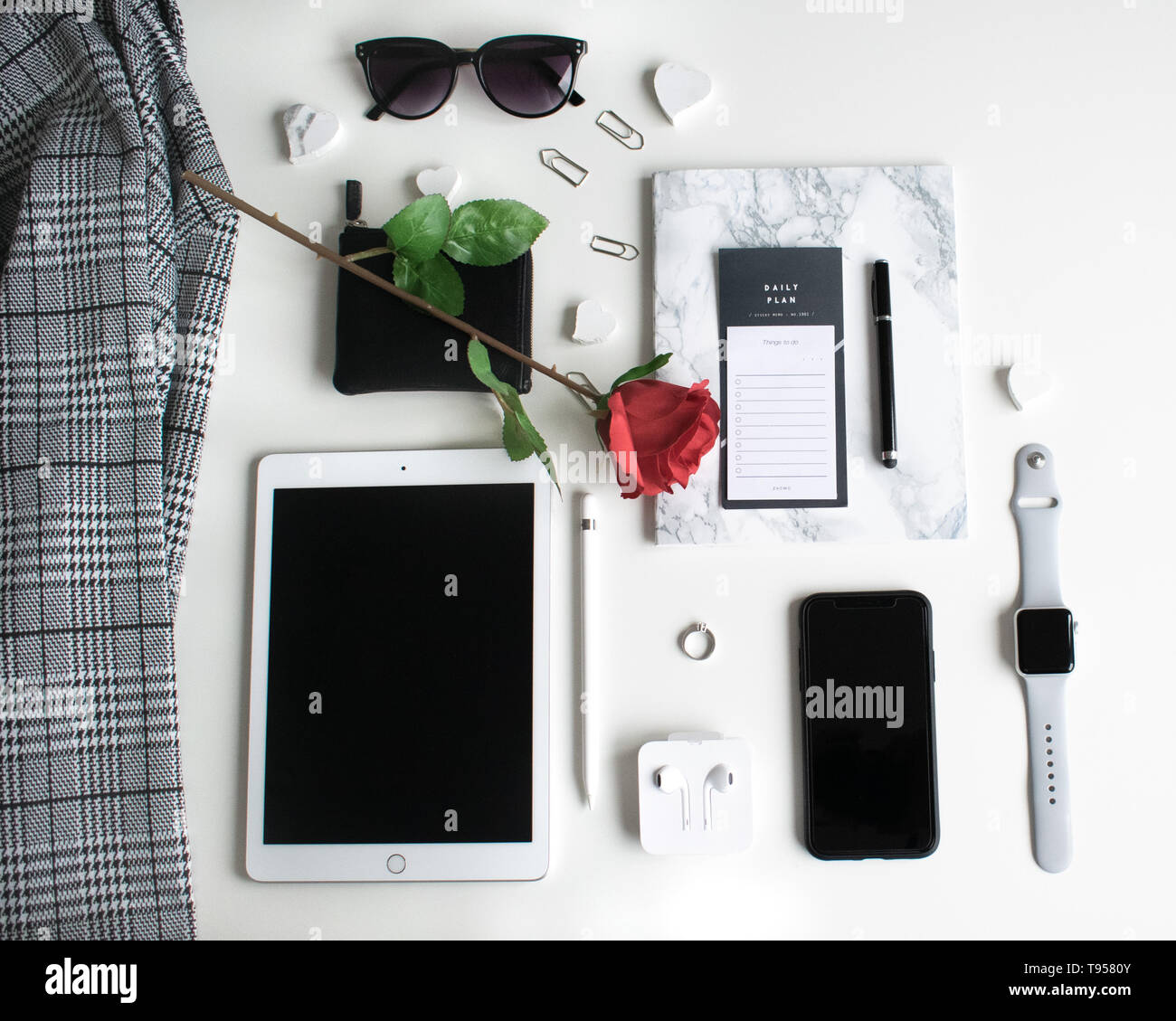 flat lay: Apple products on black and white background Stock Photo - Alamy