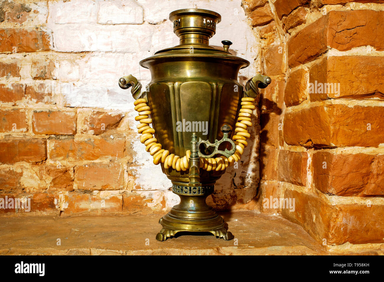 Ancient copper samovar stands in the form of decorations with lamb ...