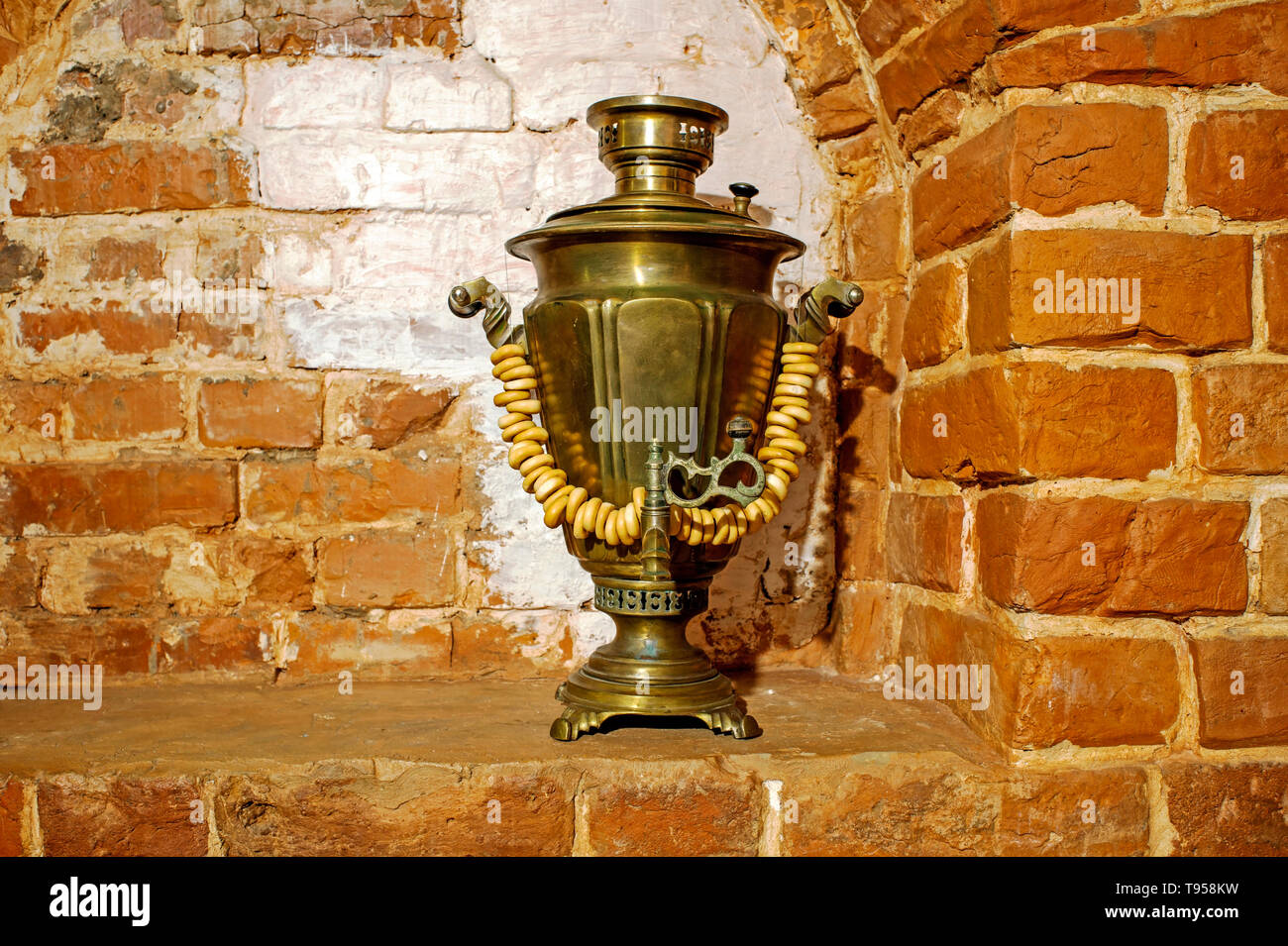 Ancient copper samovar stands in the form of decorations with lamb ...
