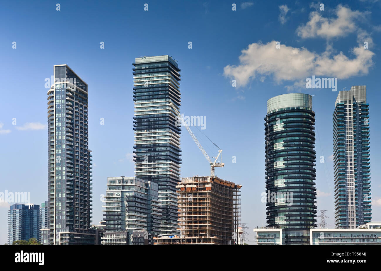 Waterfront skyline with construction of residential high rise buildings ...