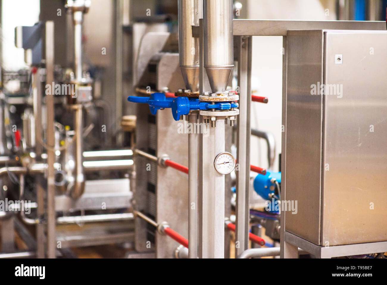 Stainless steel pipes in the factory. Construction on food production ...