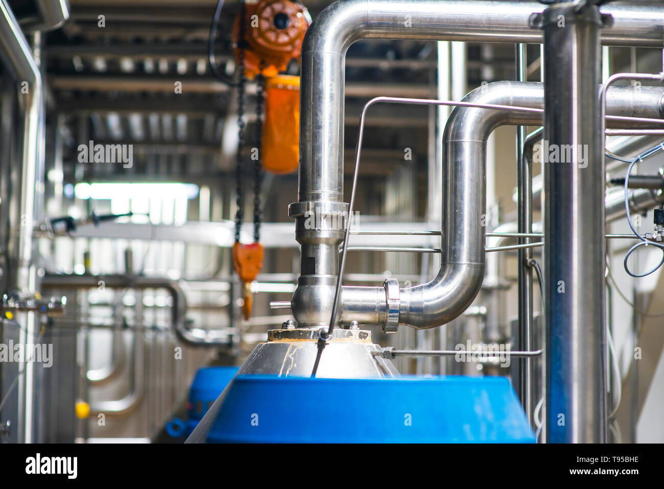 Stainless steel pipes in the factory. Construction on food production ...