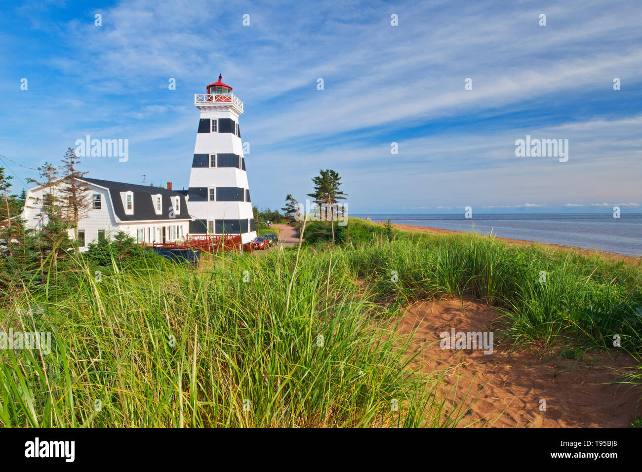 West Point Lighthouse and red sand West Point Prince Edward Island ...