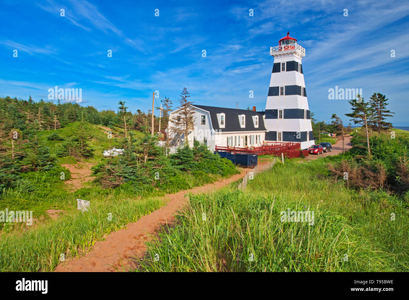 West Point Lighthouse and red sand West Point Prince Edward Island ...