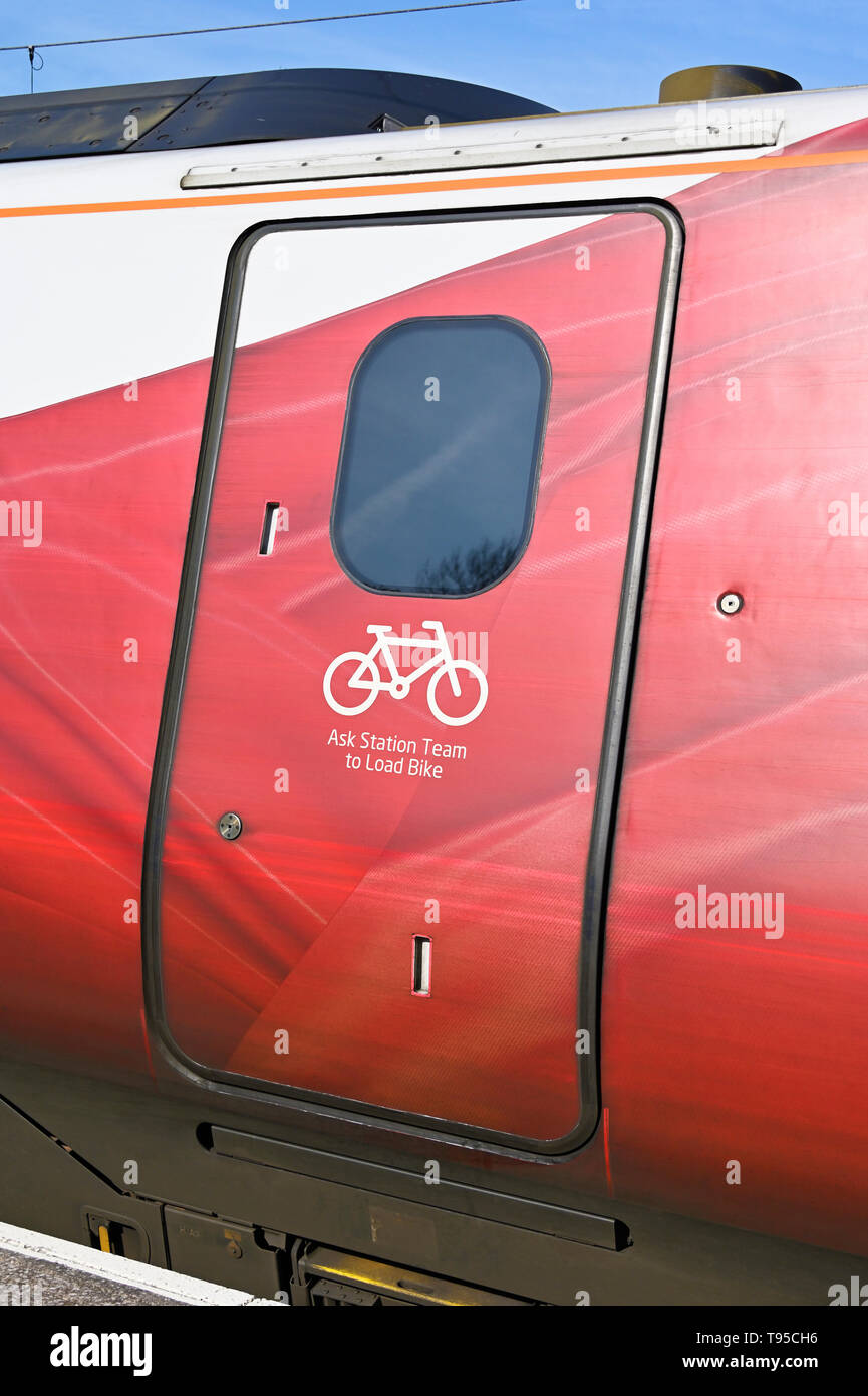 Cycle loading door. Virgin Trains Class 390 Pendolino with 'Flowing ...