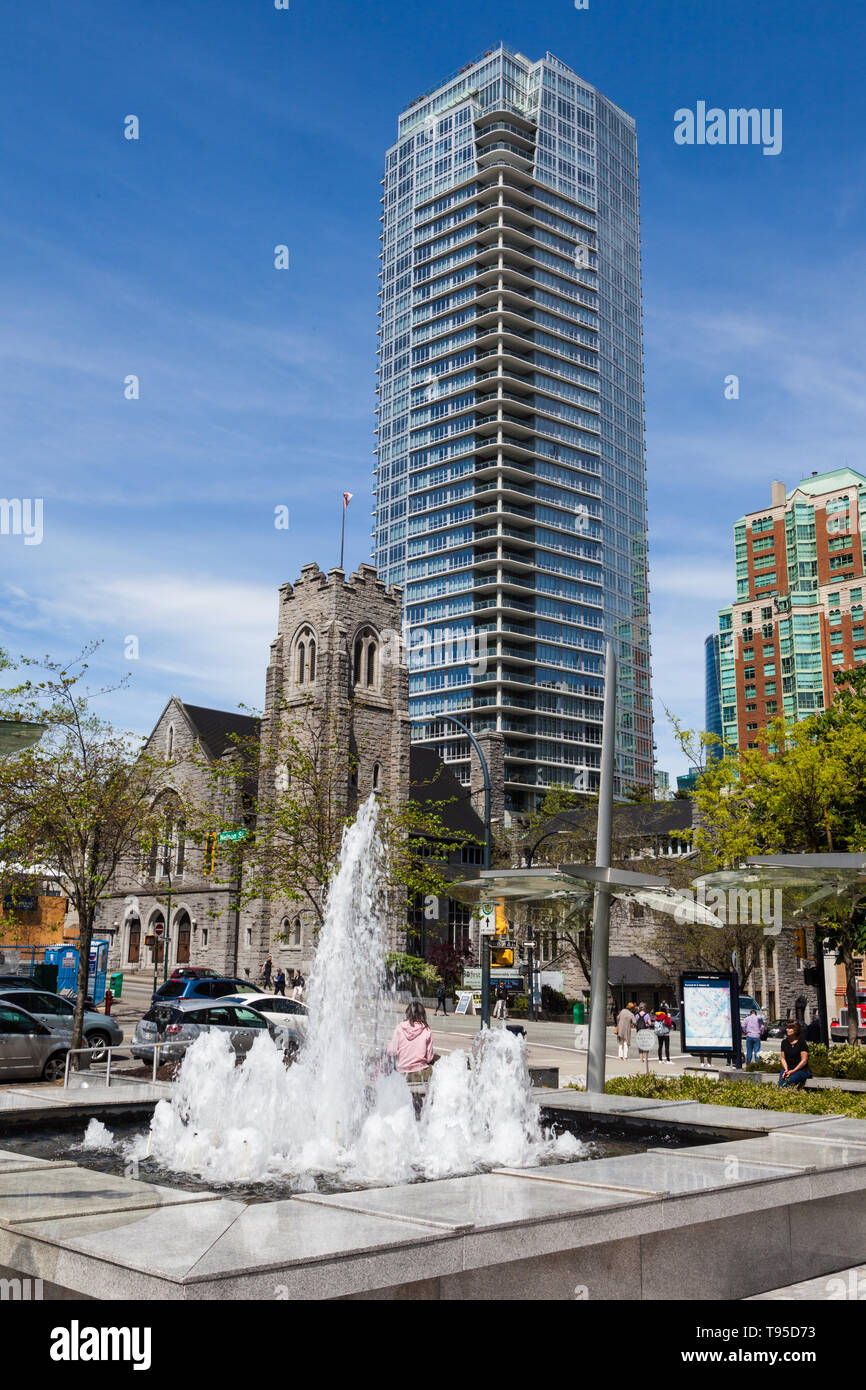 Street scene of the intersection of Nelson and Burrard streets in ...