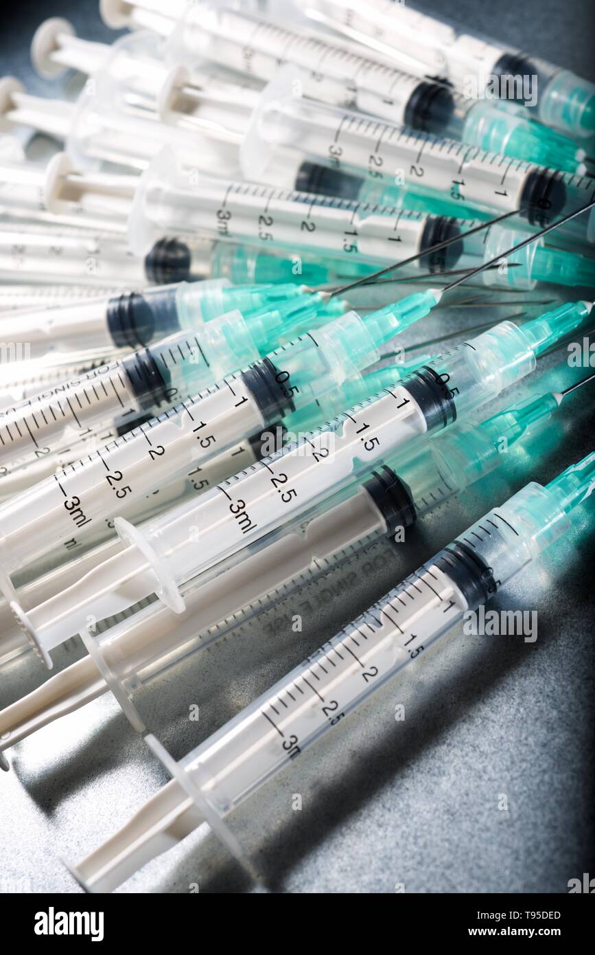 Close-up of a group of syringes Stock Photo - Alamy