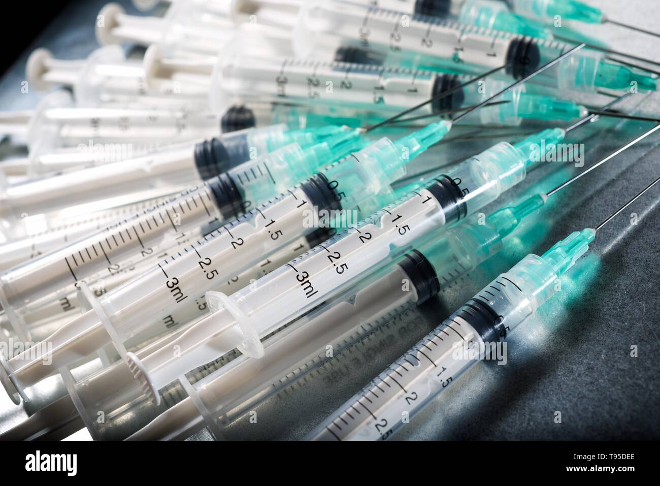 Close-up of a group of syringes Stock Photo - Alamy