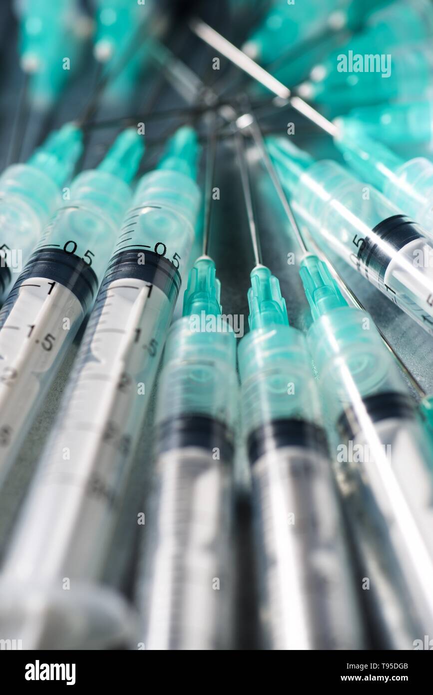 Many syringes hi-res stock photography and images - Alamy