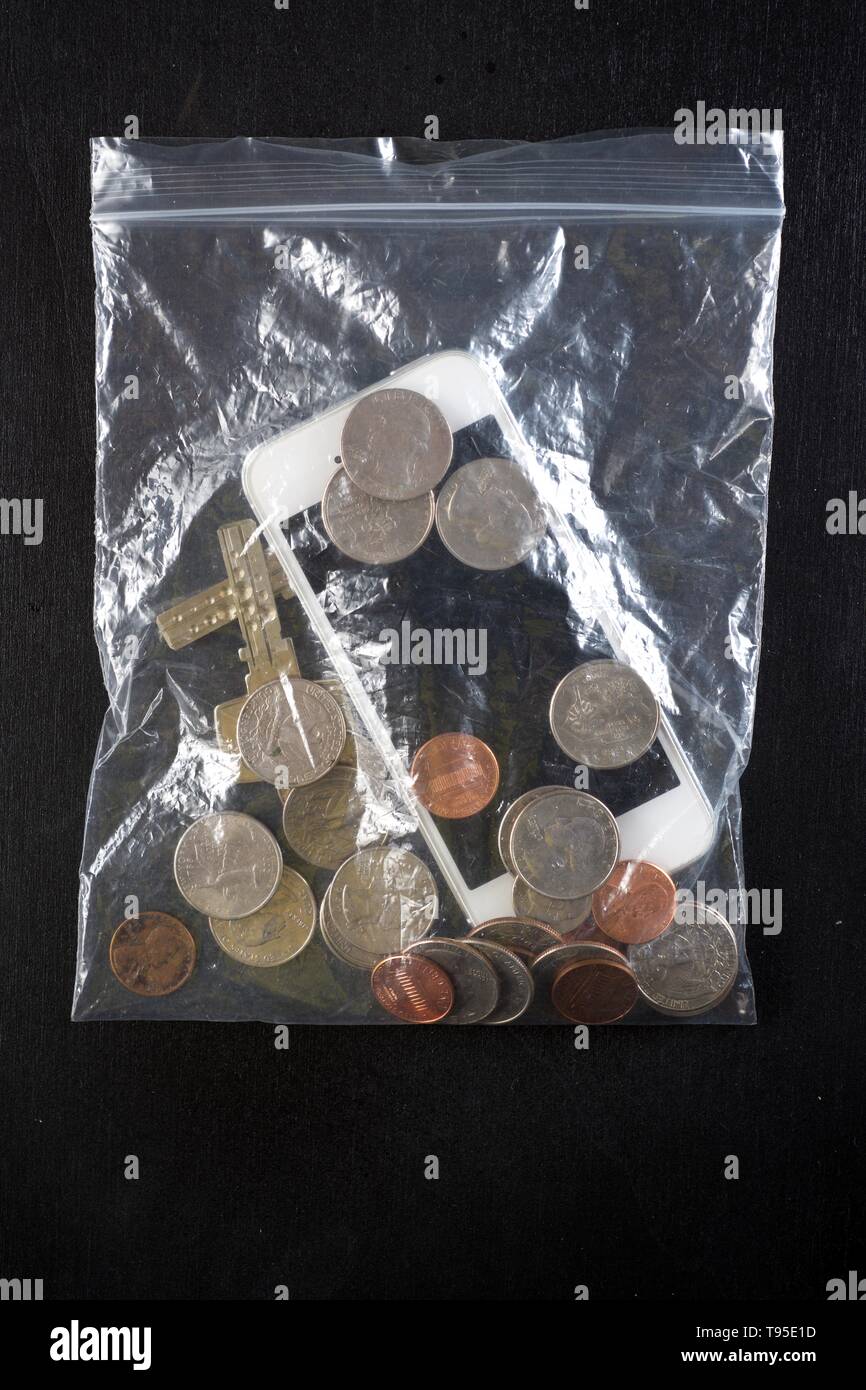 Metal objects in a plastic bag Stock Photo - Alamy