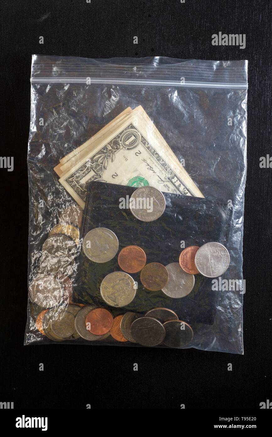 Money bag with plastic coins hi-res stock photography and images - Alamy