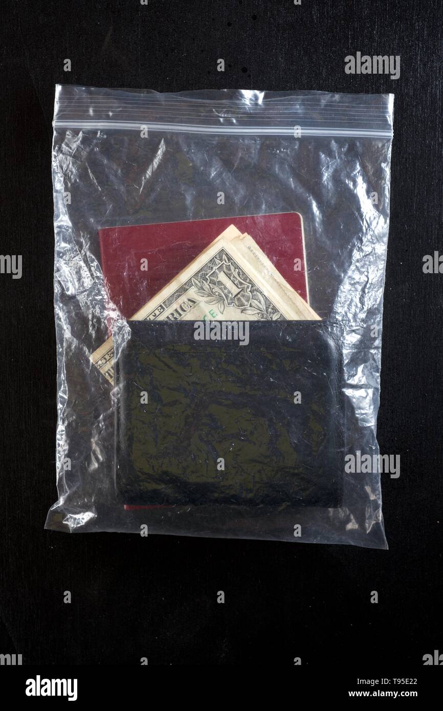 Travel objects in a plastic bag Stock Photo - Alamy
