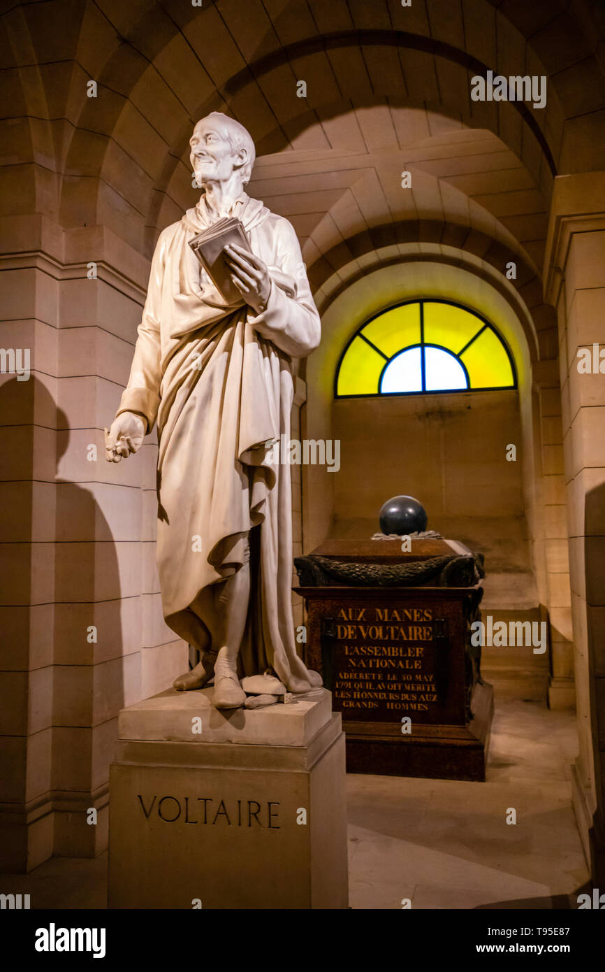 Paris, France - 24.04.2019: Voltaire's tomb and statue in the crypt of ...