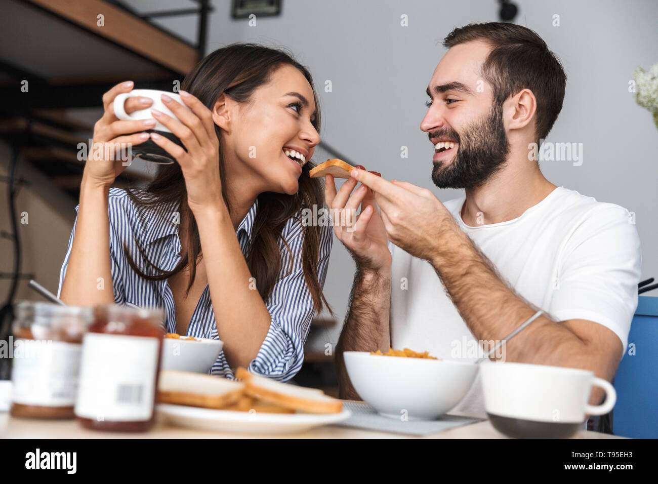 Happy asian couple having tea hi-res stock photography and images - Alamy