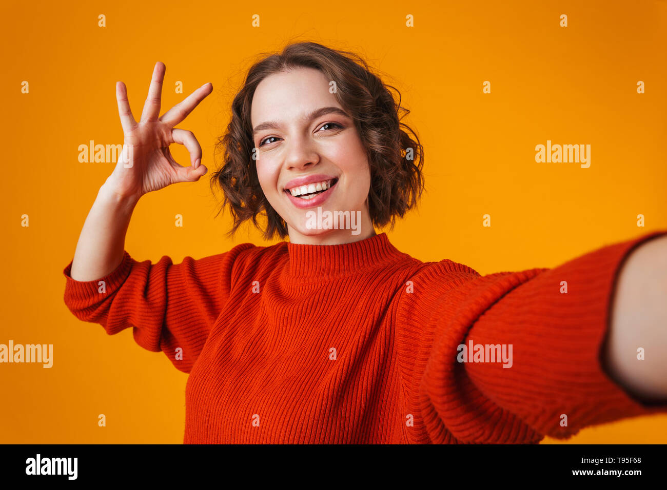 Image of excited happy emotional young pretty woman posing isolated ...