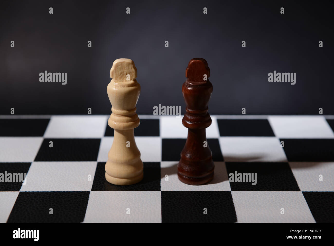 Chess pieces on game board Stock Photo - Alamy