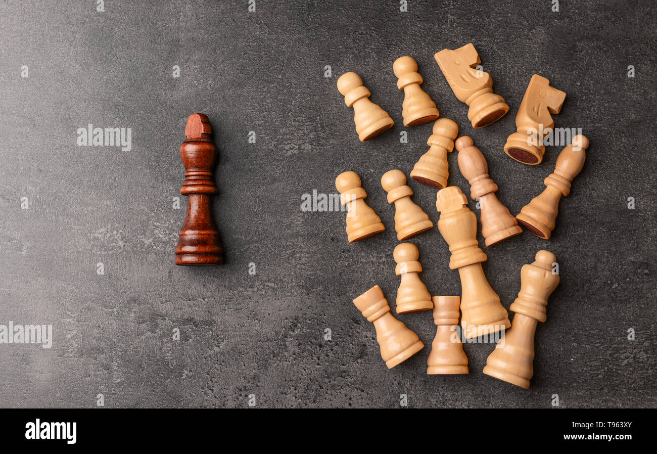 Chess pieces on grey background Stock Photo - Alamy