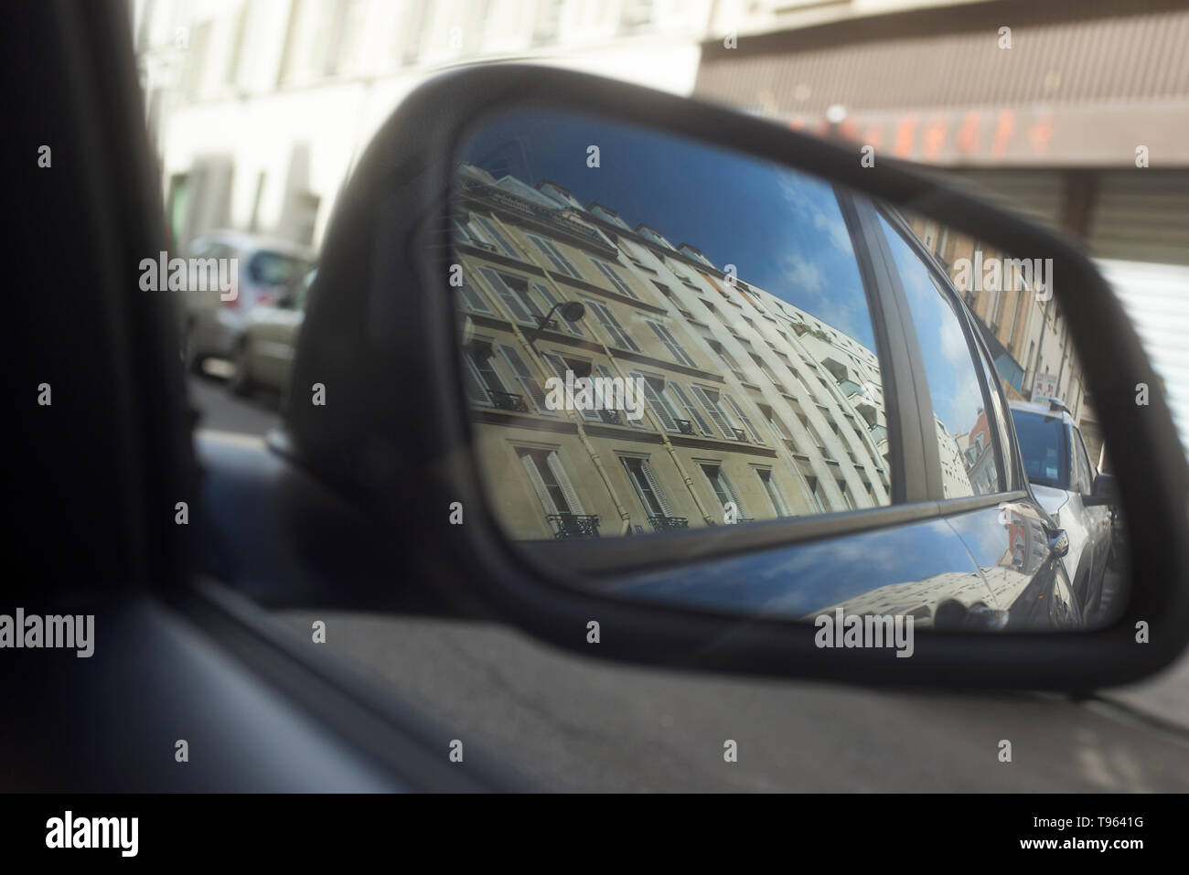 Typical buildings in the city centre of Paris seen through the rearview ...