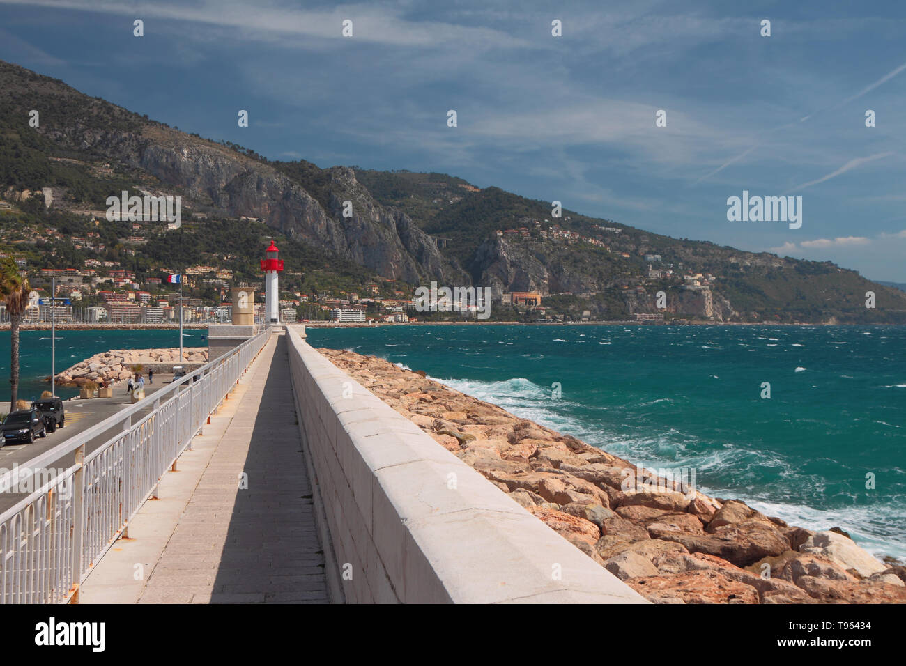 Pier with beacon. Menton, Nice, France Stock Photo - Alamy