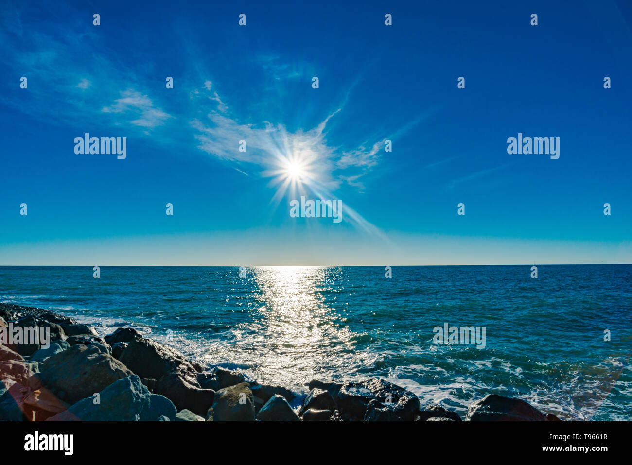 A sunny day on the ocean Stock Photo - Alamy
