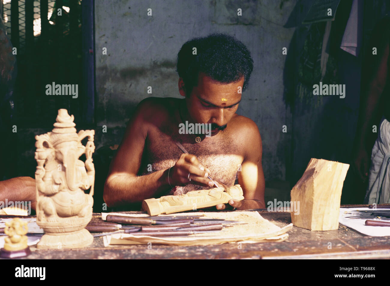 SANDALWOOD CARVER, CARVING AN IDOL OUT OF SANDALWOOD,TRADITIONAL INDIAN ...