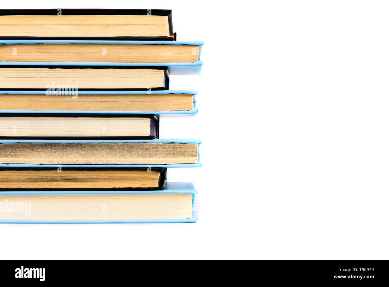Stack of black and blue books isolated on white Stock Photo - Alamy