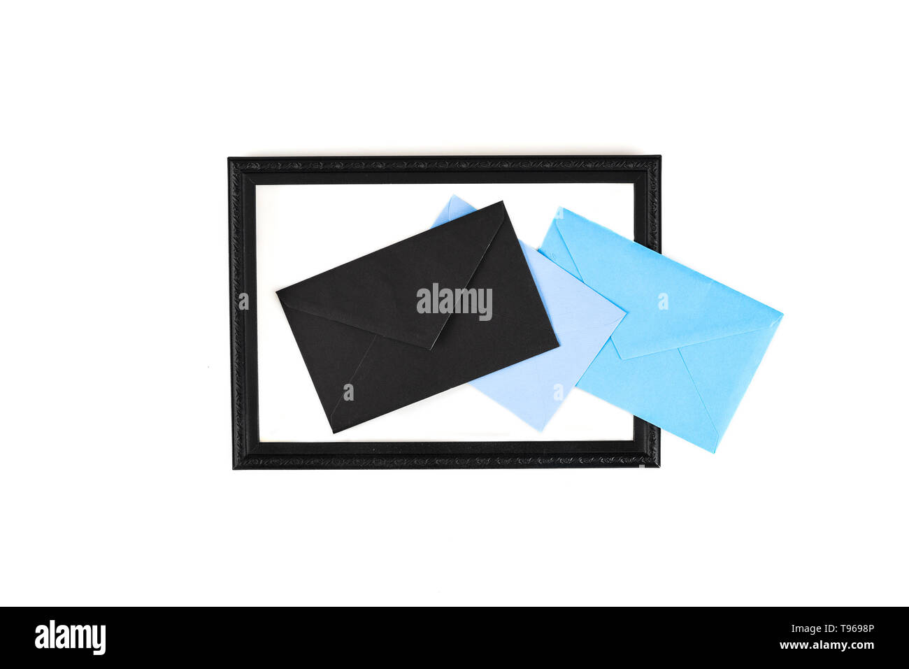 Top view of frame and envelopes isolated on white Stock Photo - Alamy