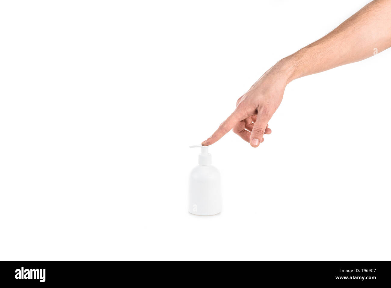 Partial view of man pushing spray on cream bottle isolated on white ...