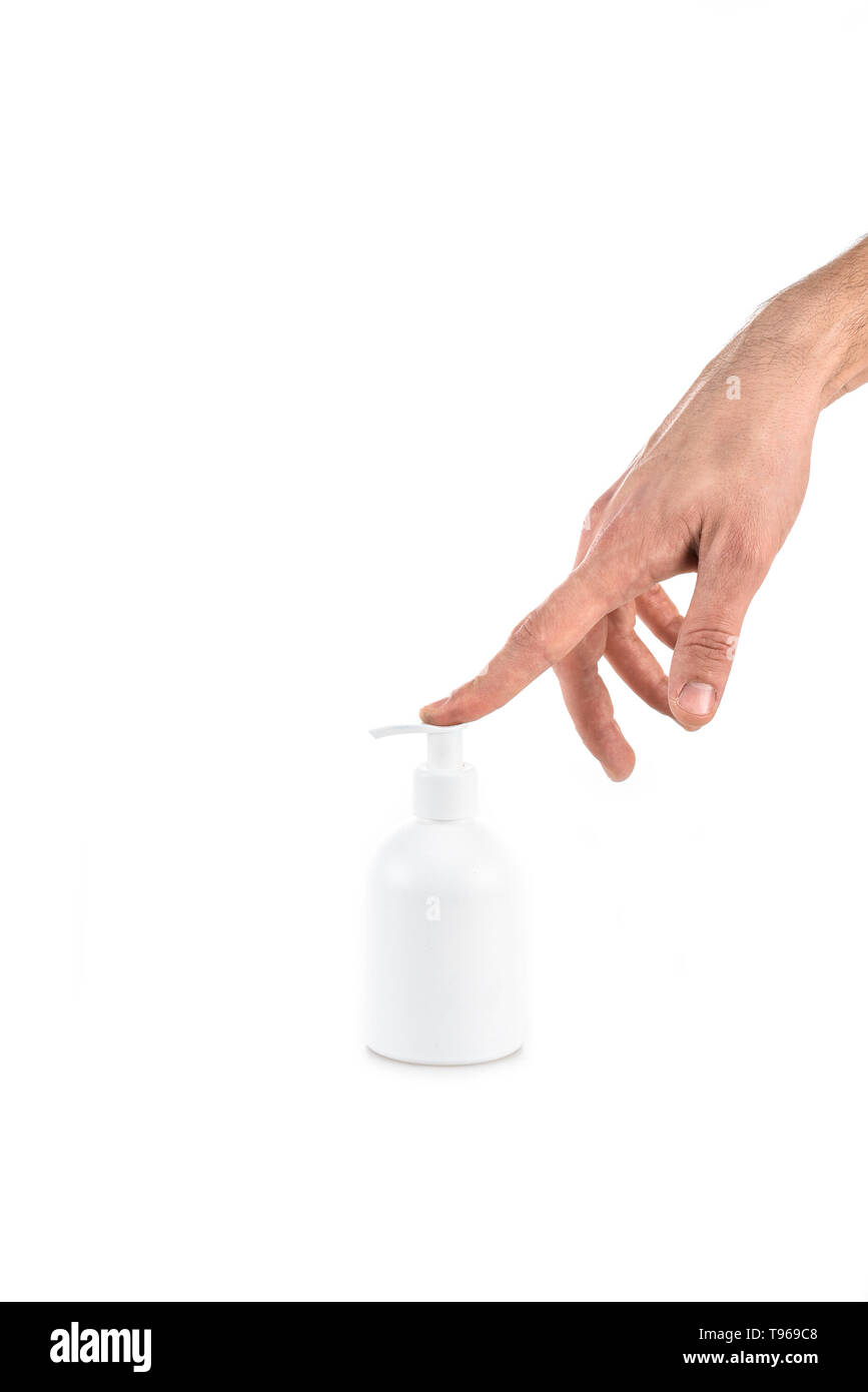 Partial view of man pushing spray on cream bottle isolated on white ...