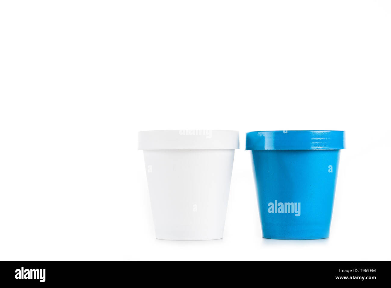 White and blue plastic cups isolated on white Stock Photo - Alamy