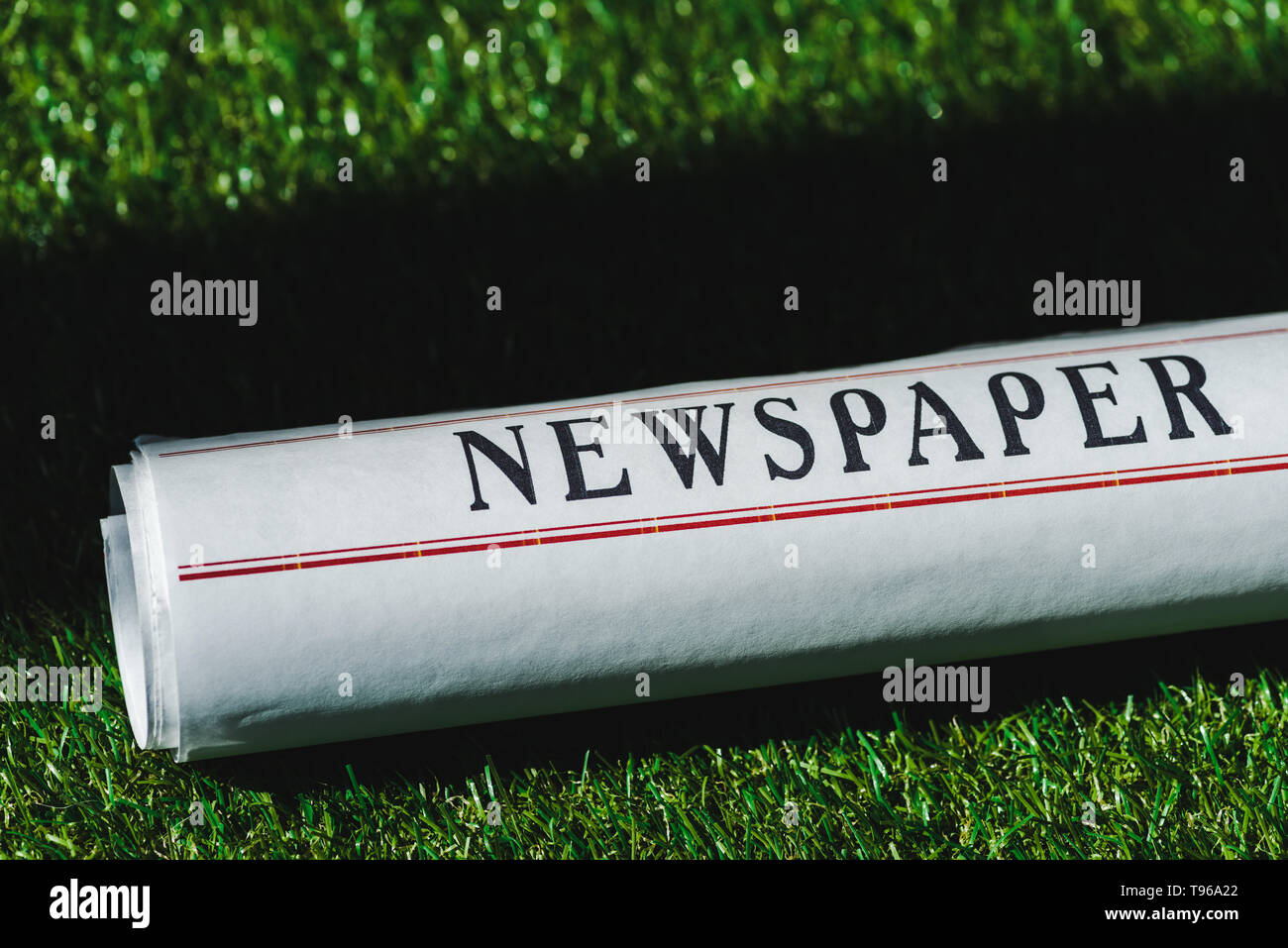 Rolled newspaper hi-res stock photography and images - Alamy