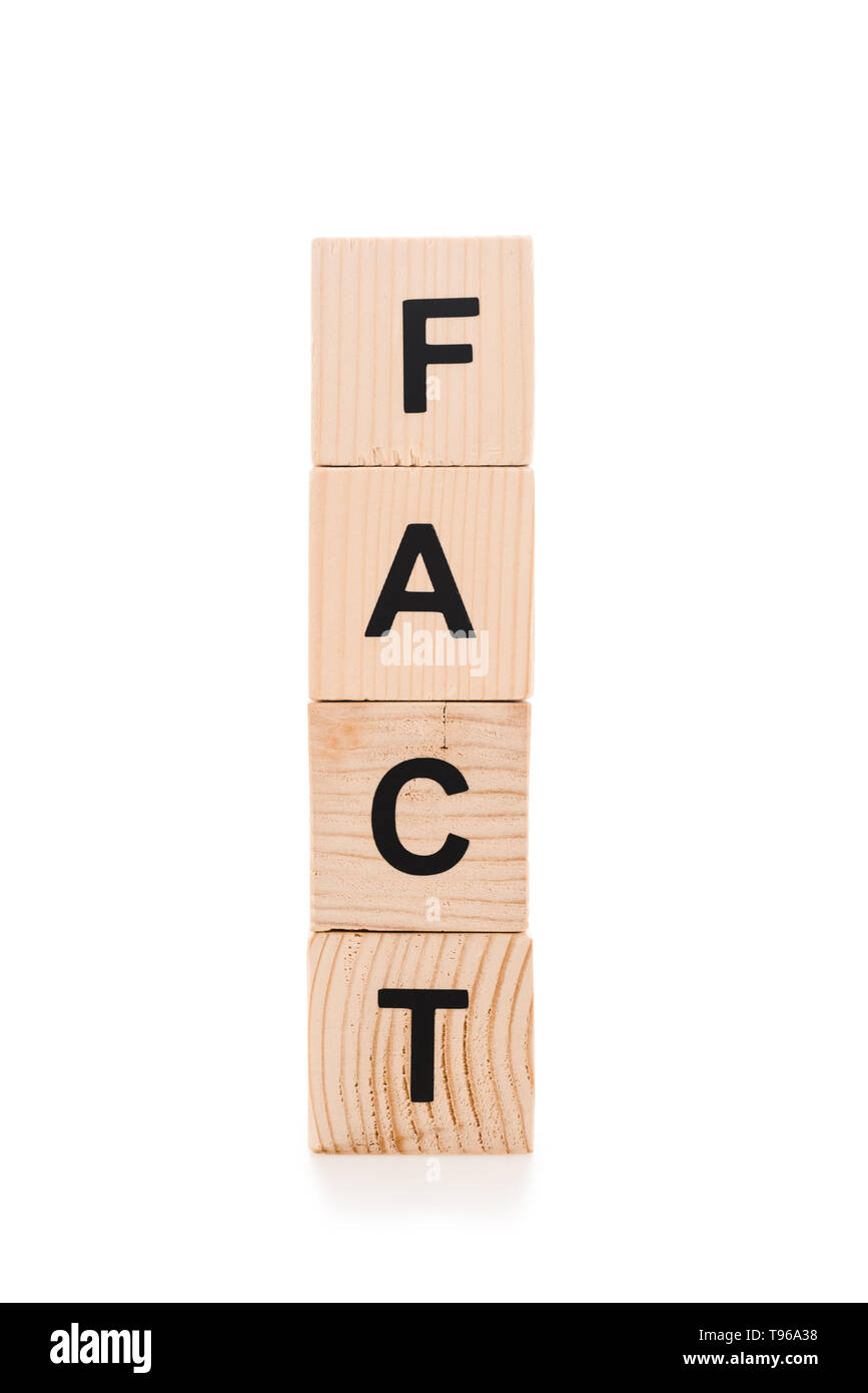 black fact lettering made of wooden blocks isolated on white Stock ...