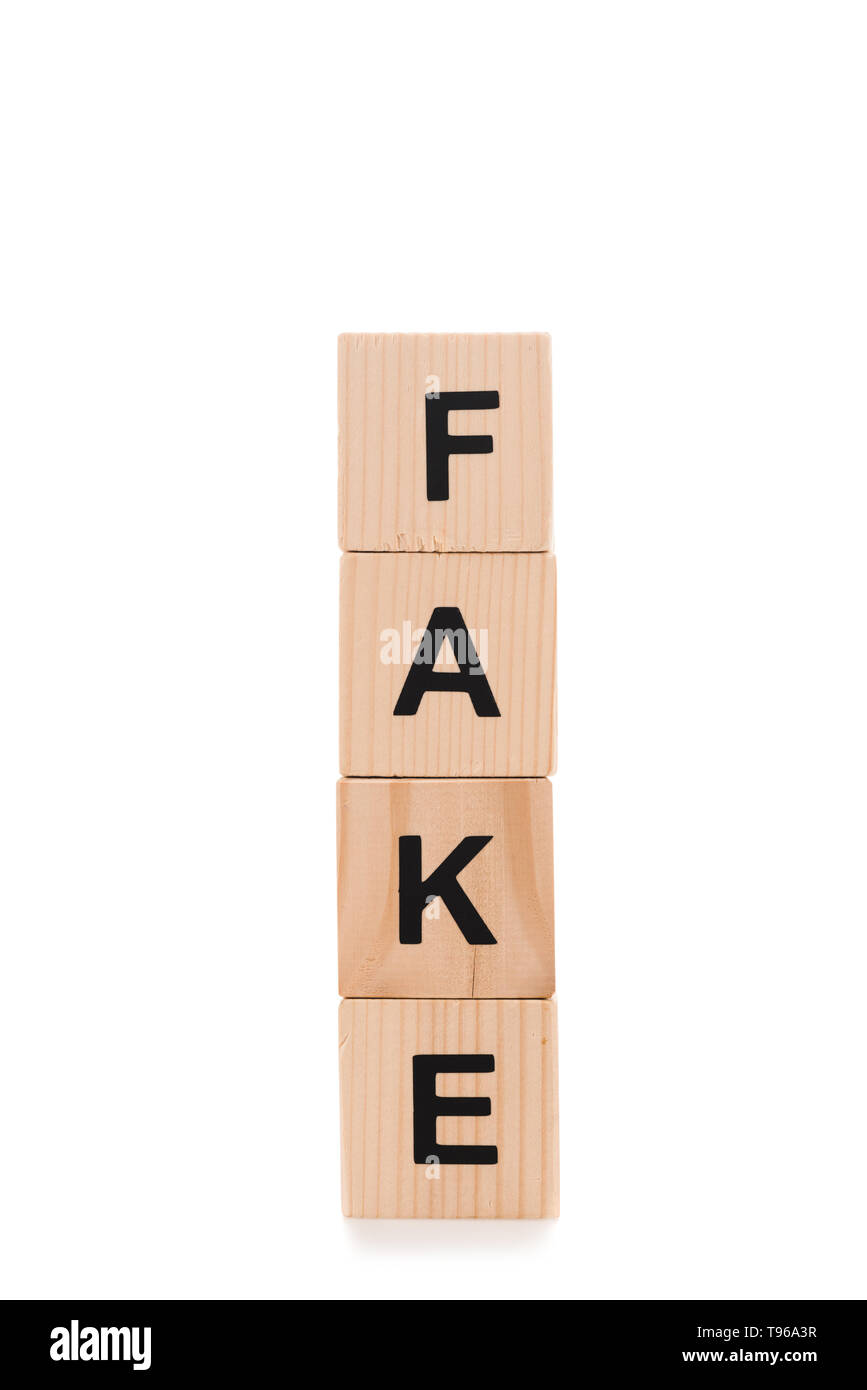 fake lettering made of wooden cubes isolated on white Stock Photo - Alamy