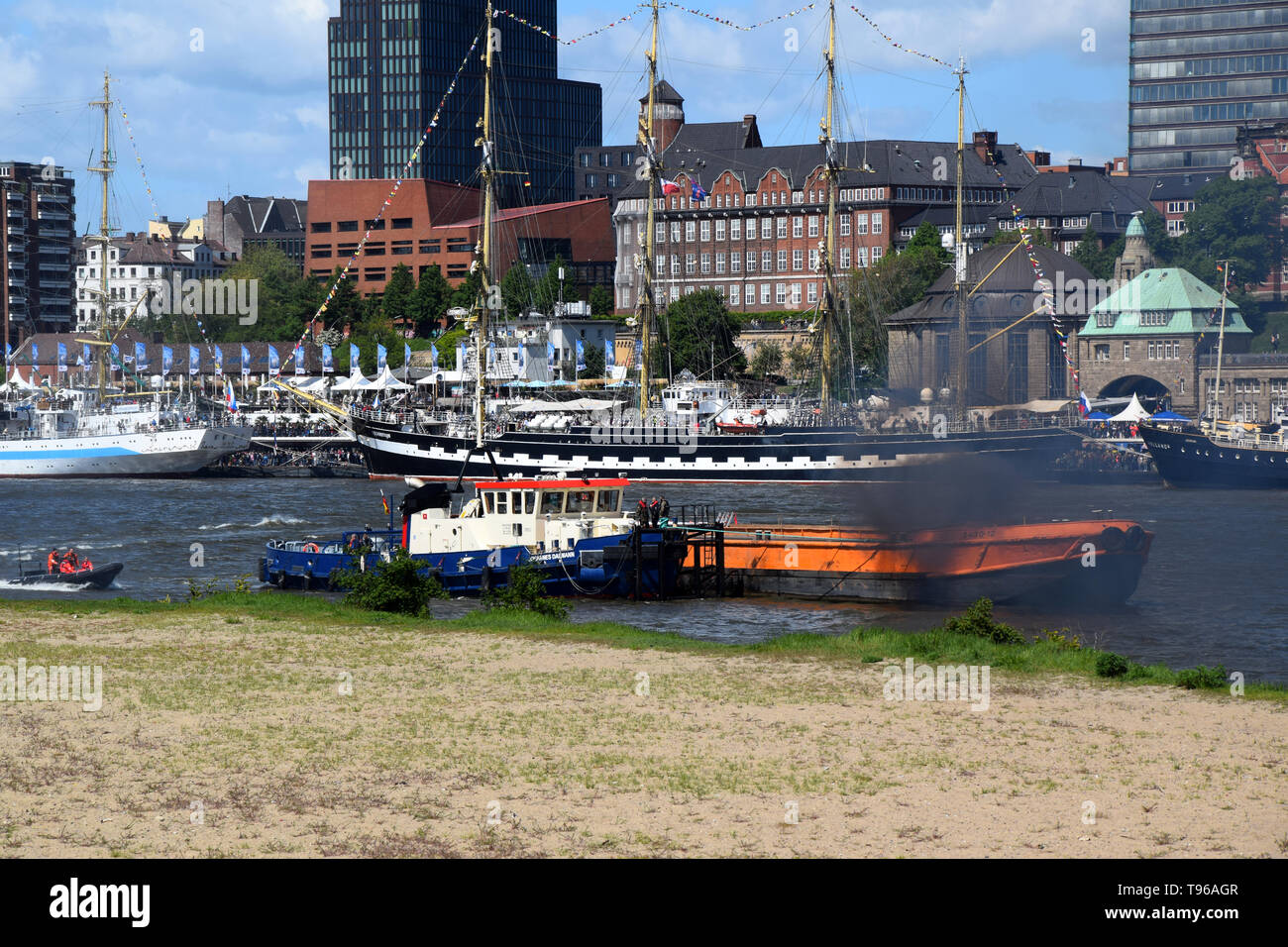 Fire Department Pump Boat in Action at the St. Pauli-Landungsbrücken ...
