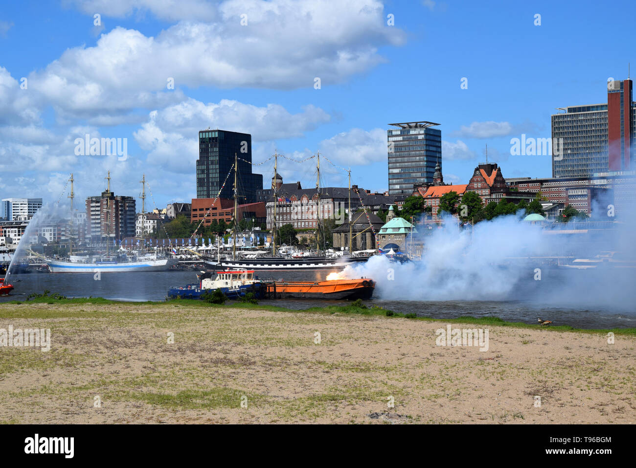 Fire Department Pump Boat in Action at the St. Pauli-Landungsbrücken ...