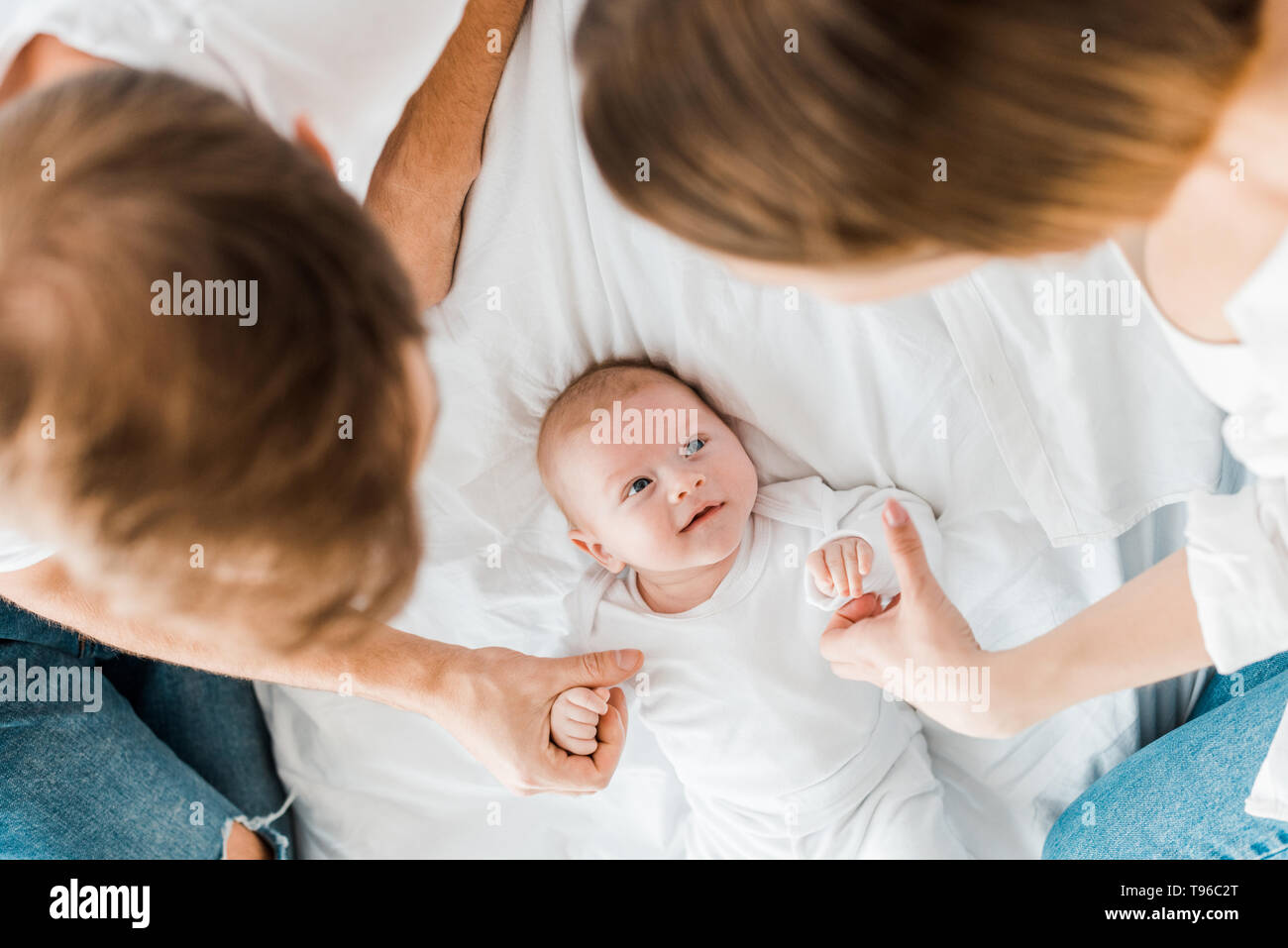 Parents baby bed overhead hi-res stock photography and images - Alamy