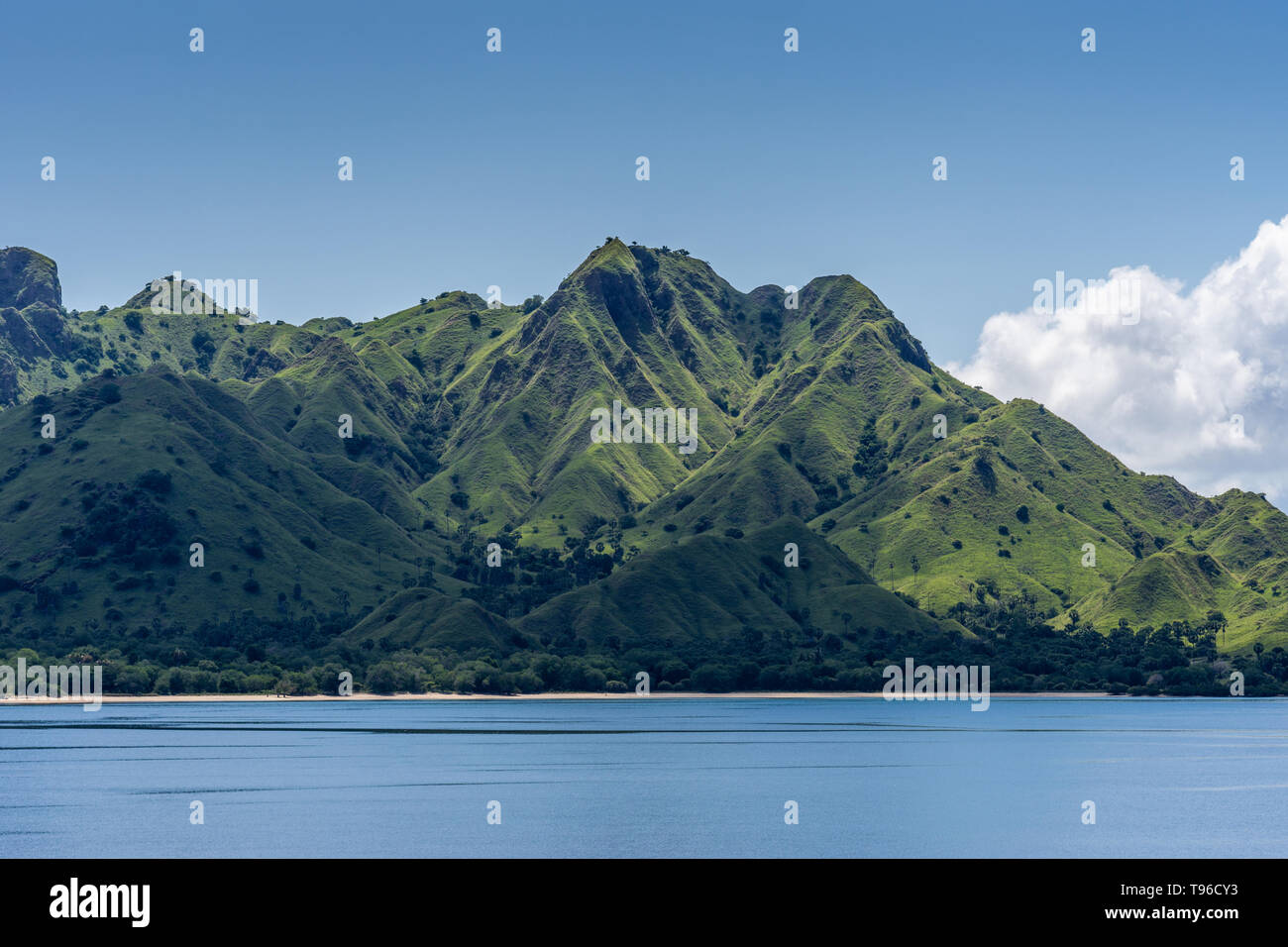 Komodo Island, Indonesia - February 24, 2019: Green mountain range ...