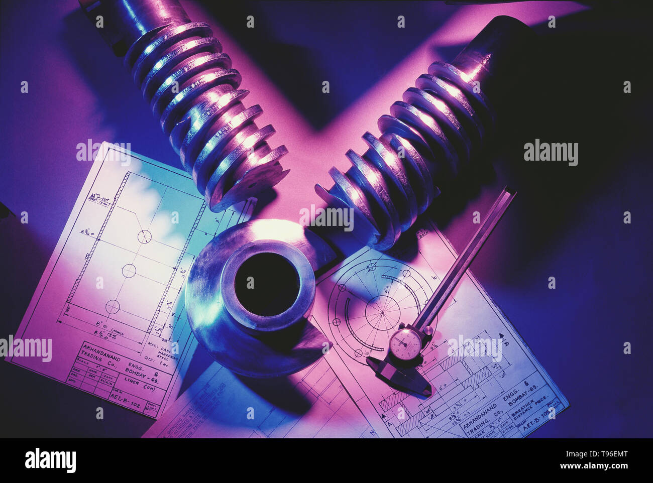 A STILL LIFE OF AN ENGINEERS TABLE WITH DRAWINGS, CALIPHER AND SOME ...