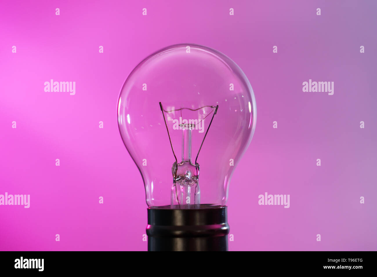 Light bulb on color background Stock Photo - Alamy
