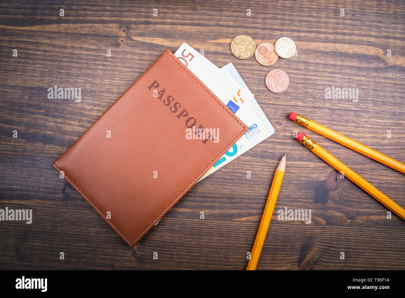 Euro money and passport Stock Photo - Alamy