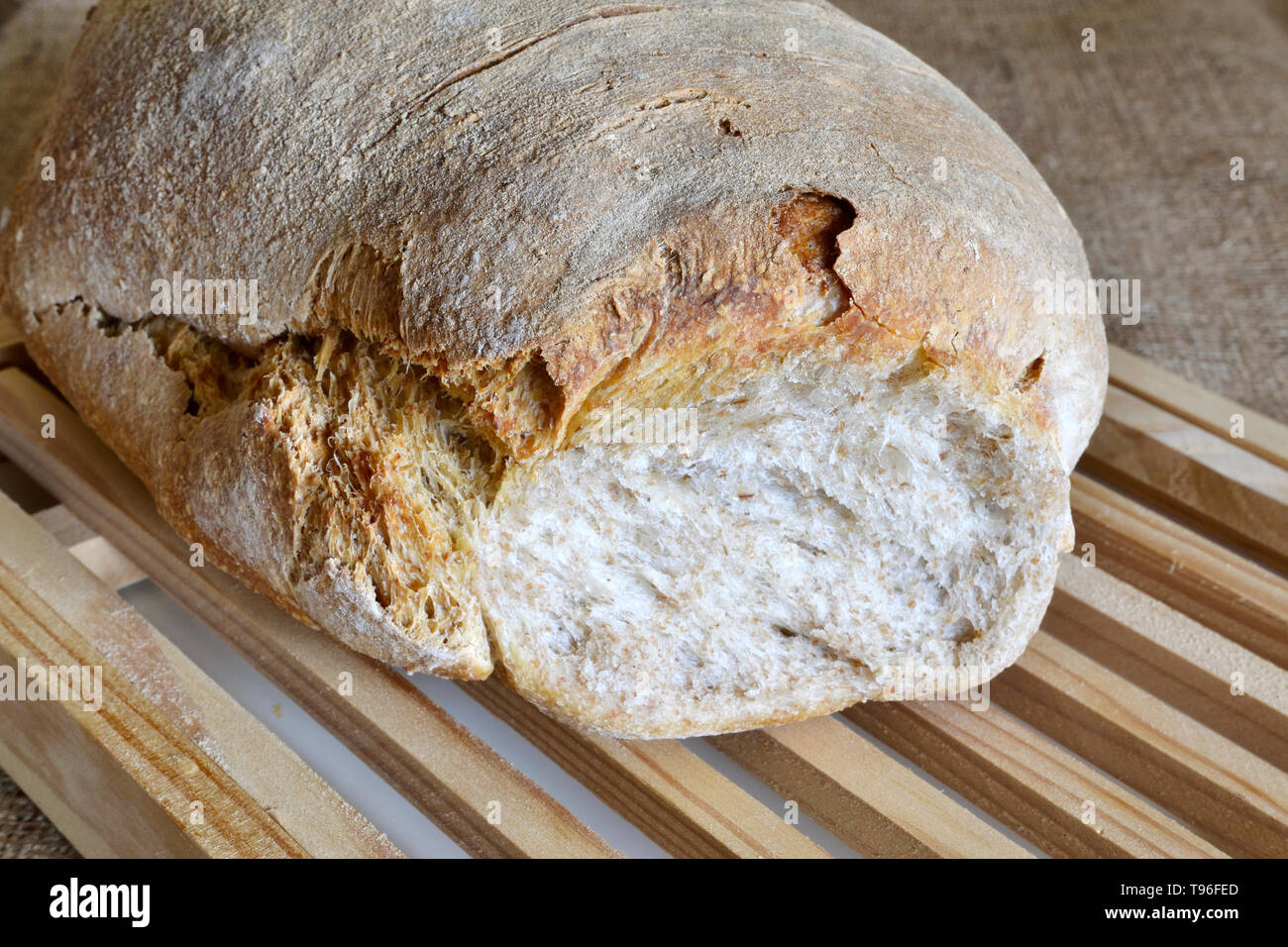 Italian food: loaf of bread on a cutting board, Italy Stock Photo - Alamy