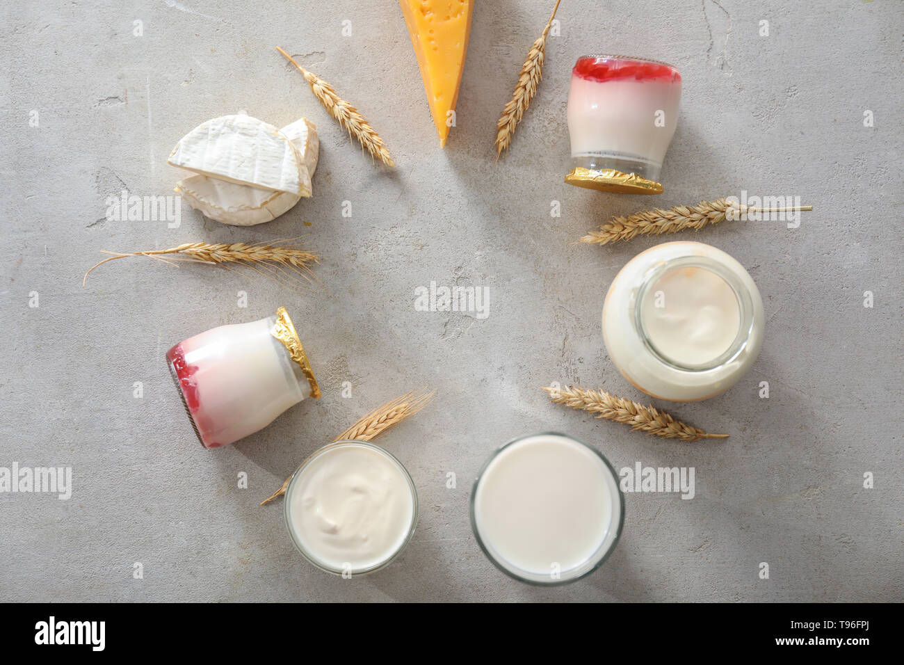 Frame made of different milk products on grey background Stock Photo ...