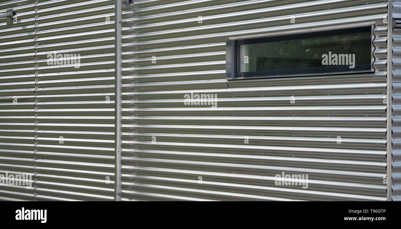side view of a facade covered with corrugated iron sheets Stock Photo ...
