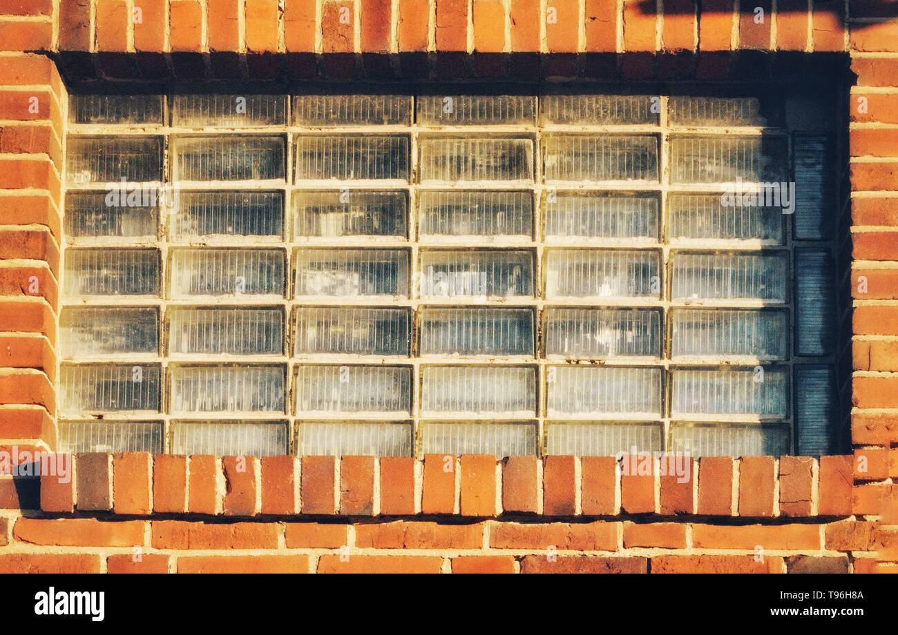 Old brick wall with brick filled window Stock Photo - Alamy