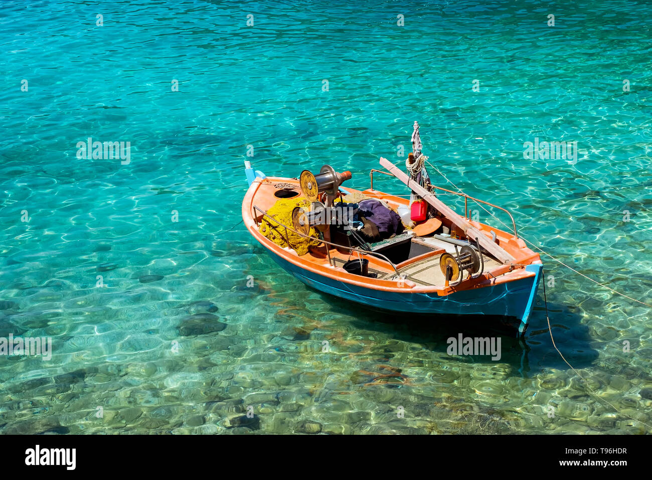 Colourful fishing boat on the sea Stock Photo - Alamy
