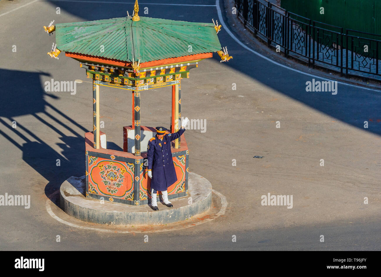 Policeman directing traffic in the capital of Bhutan Thimpu. Bhutan ...