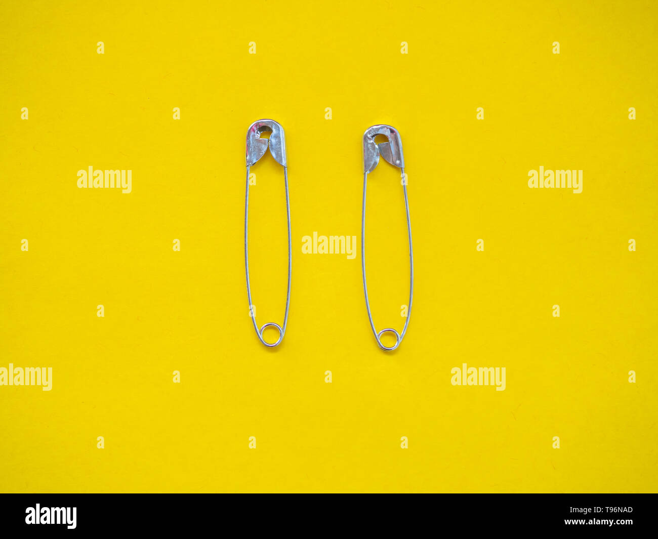 Lots of safety pins. Team concept Stock Photo - Alamy