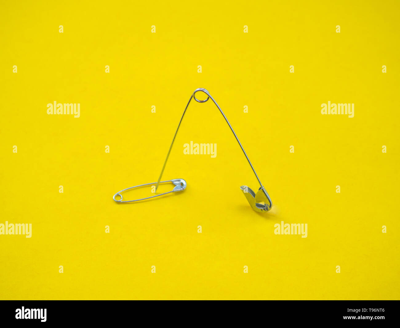 Lots of safety pins. Team concept Stock Photo - Alamy