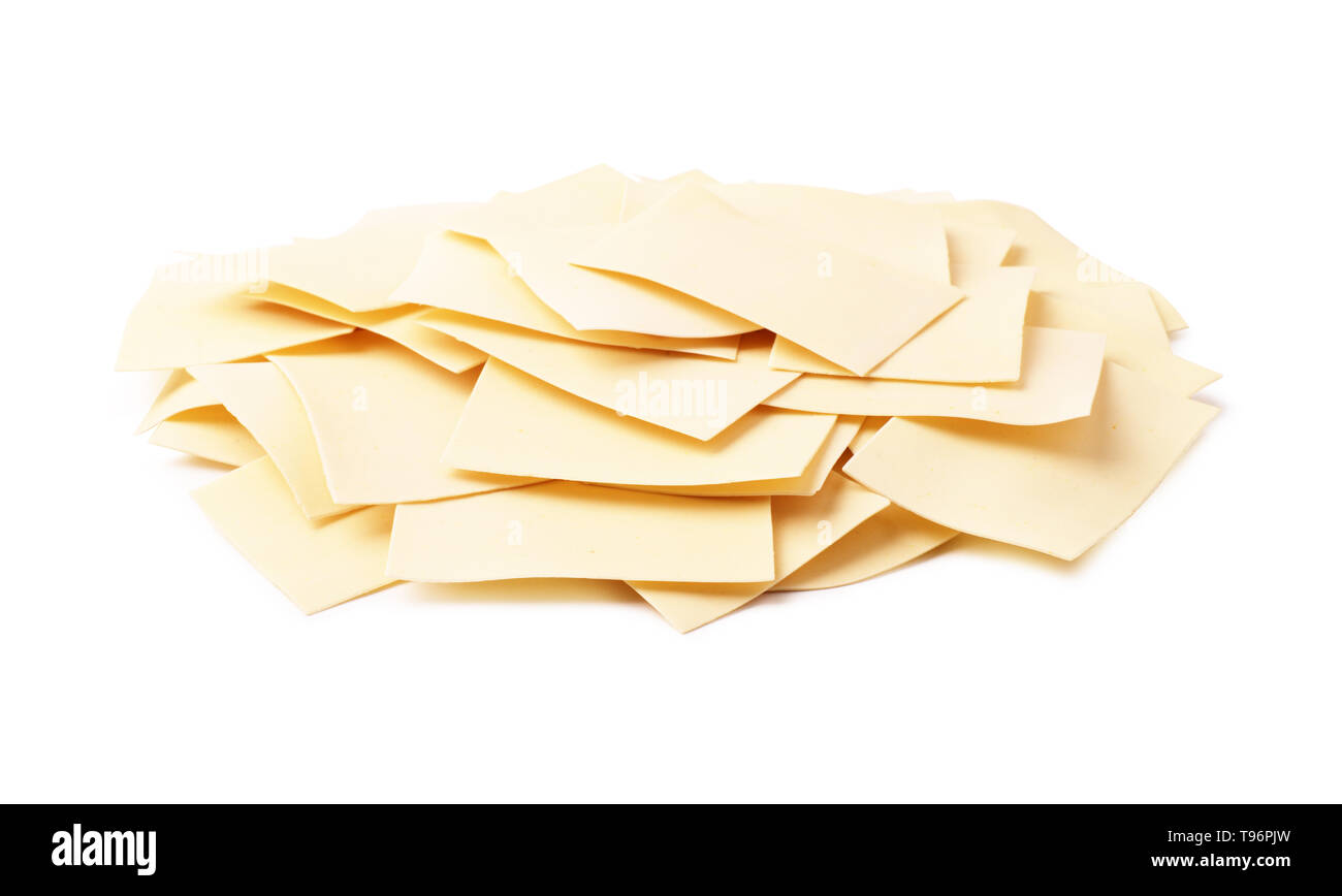 Uncooked raw stack of lasagna pasta isolated on white background Stock ...